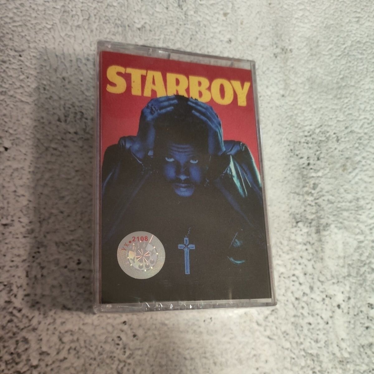 Аудиокассета The Weeknd — Starboy, чёрный корпус, 18 треков, хиты Starboy и I Feel It Coming, новая, подарок