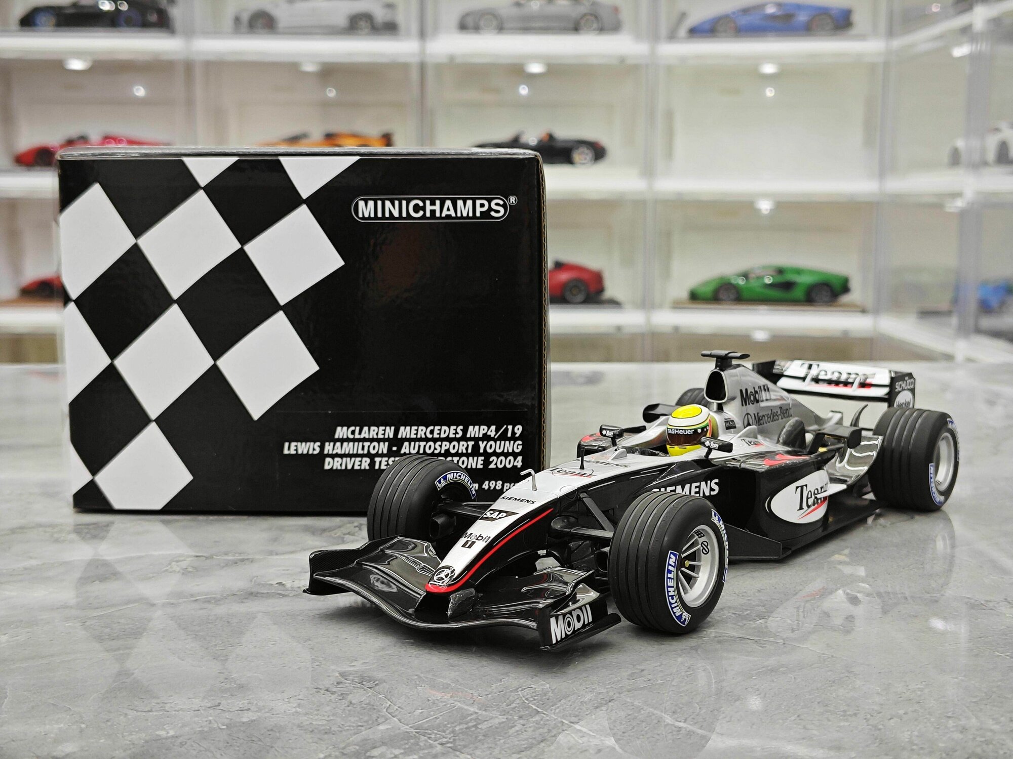 MINICHAMPS Коллекционная модель McLaren Mercedes MP4/19 Lewis Hamilton Autosport Young Driver Test Silverstone 2004 масштаб 1:18 уникальная ливрея первого теста будущего чемпиона