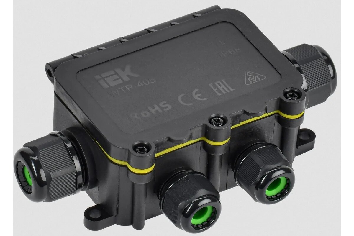 Распределительная коробка IEK WTP‑405 черная IP68 из пластика для наружного монтажа с 6 кабельными вводами и уплотнителями разных диаметров.