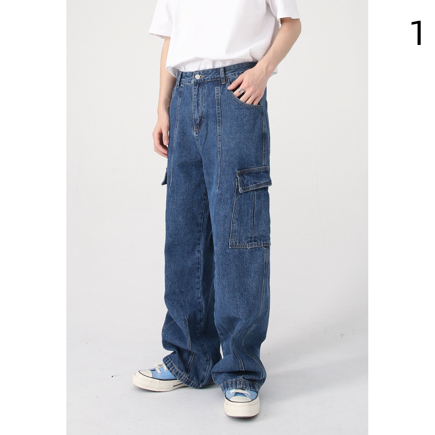 Винтажные американские рабочие джинсы свободного кроя с контрастными вставками и большими карманами.