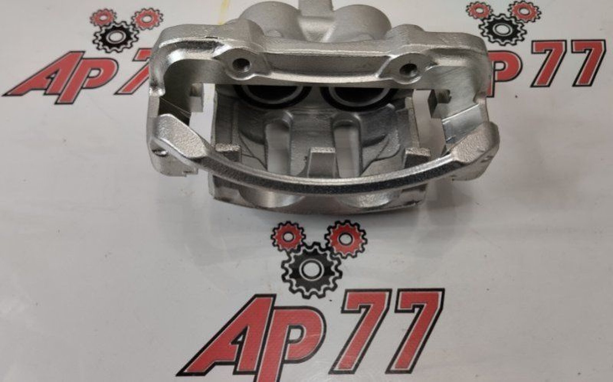 Суппорт Nissan Datsun BD22 FR 2 поршневой 4100157G00 передний правый