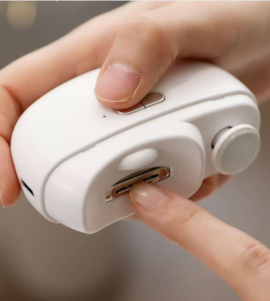 Машинка для стрижки ногтей , электрическая, белая