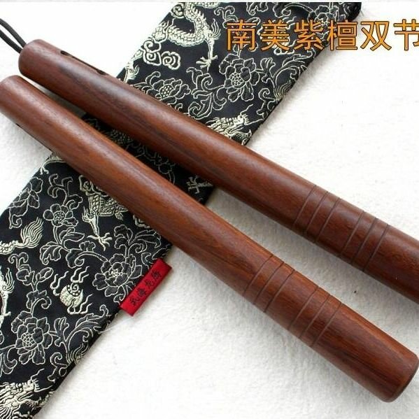 Двухсекционный кейк из палисандра, сверхпрочный и водонепроницаемый. Высококачественные нунчаки из красного дерева, изготовленные в Южной Америке.