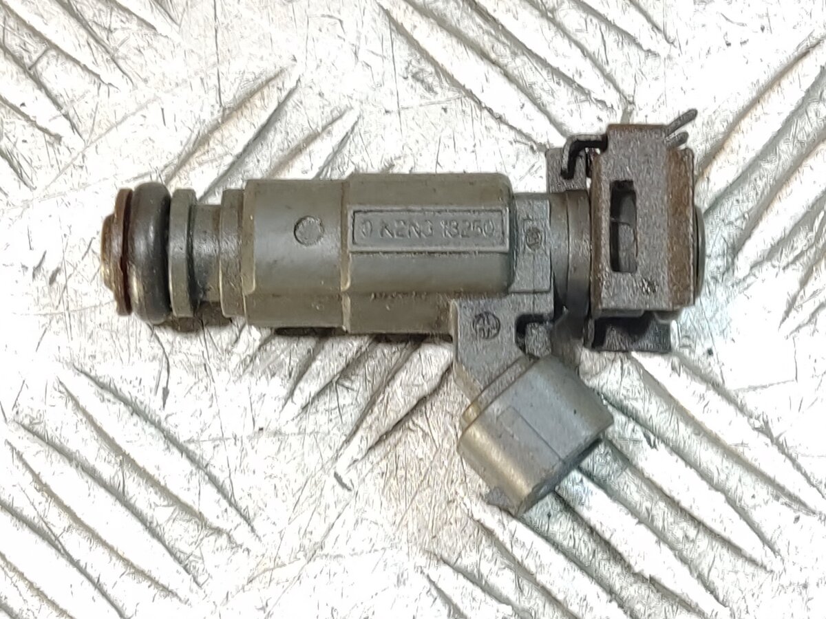 Форсунка двигателя KIA Spectra 2001-2011 0K2N313250