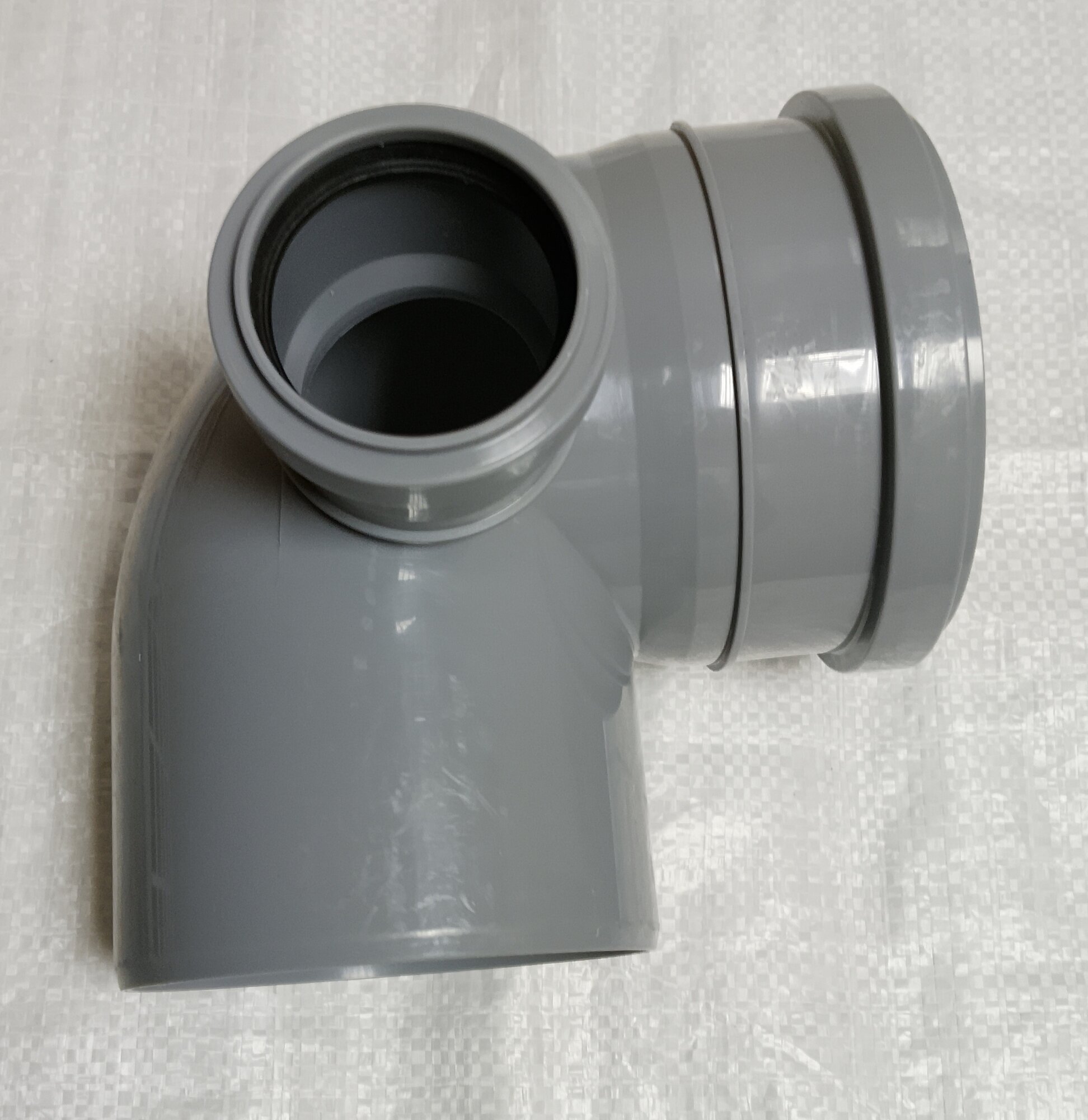 Отвод ПП 110 х 87,5 ° "Политэк" с левым выходом на 50.