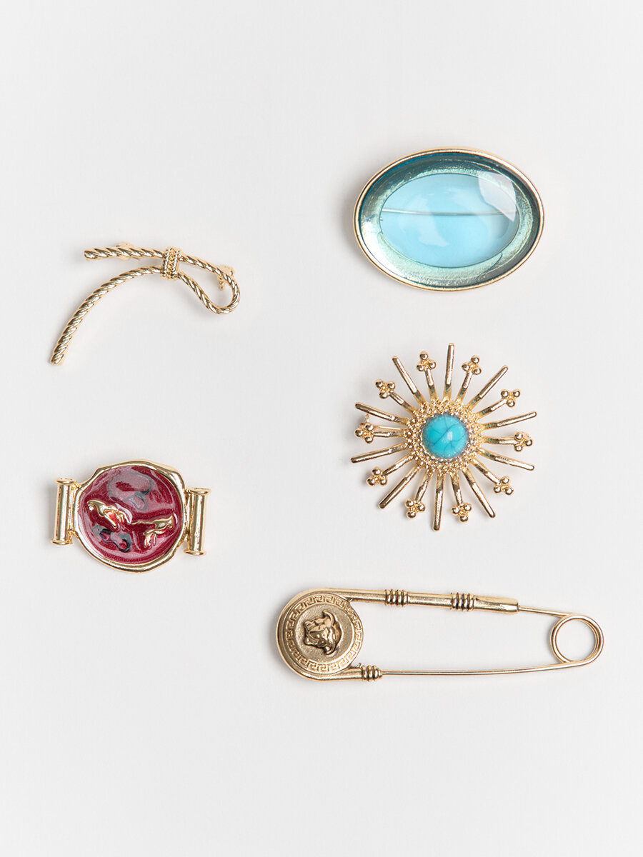 Комплект брошей