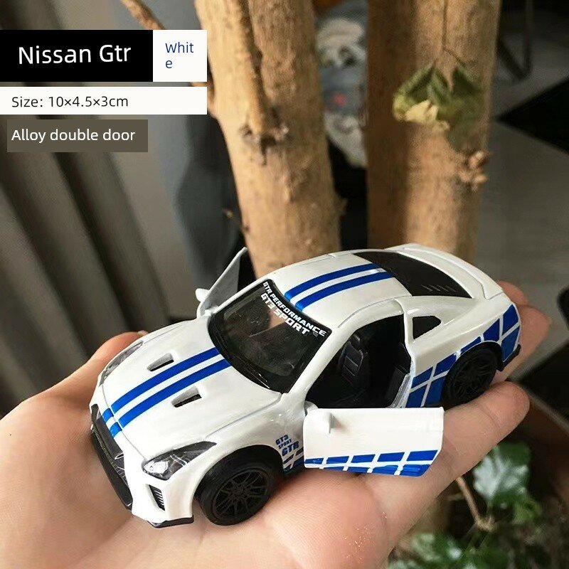 Модель автомобиля 1:43 масштаба Track Edition Ниссан GTR белого цвета, металлическая