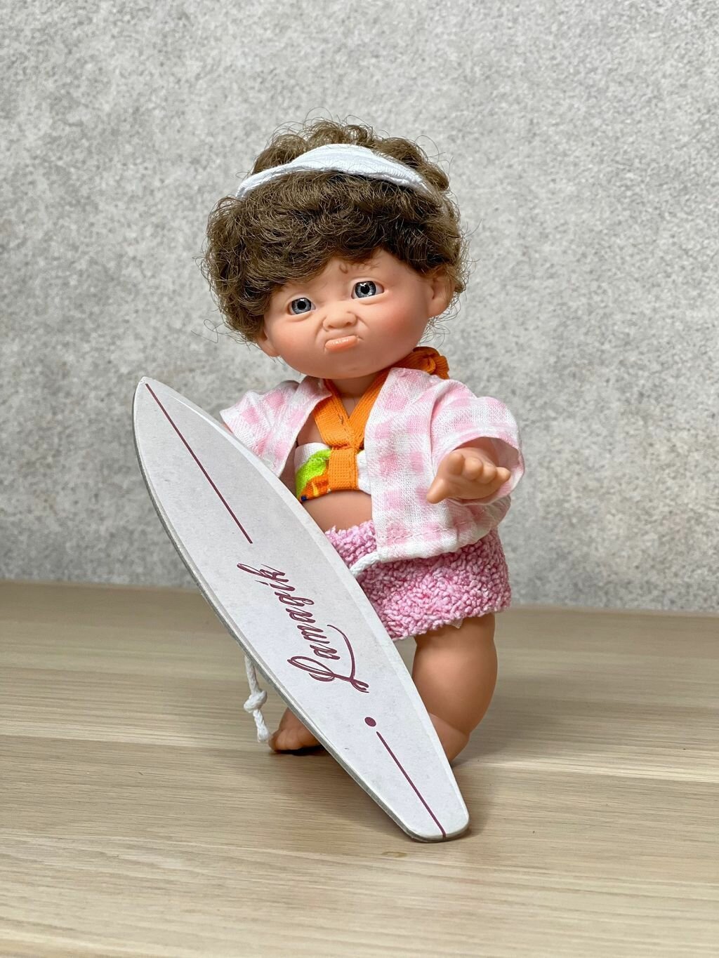 Кукла LAMAGIK виниловая 18 см Gestitos Surfero
