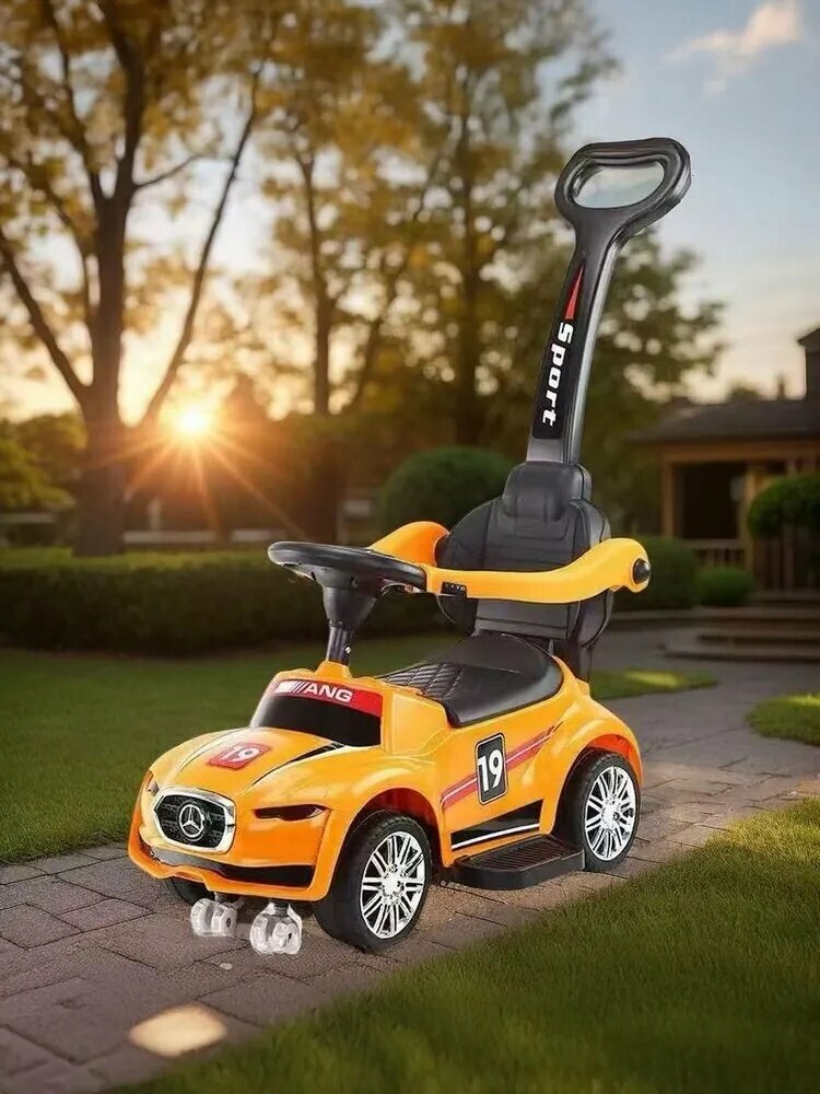 Детская машинка-каталка с ручкой и педалями для малышей от 1 до 3 лет (оранжевая)