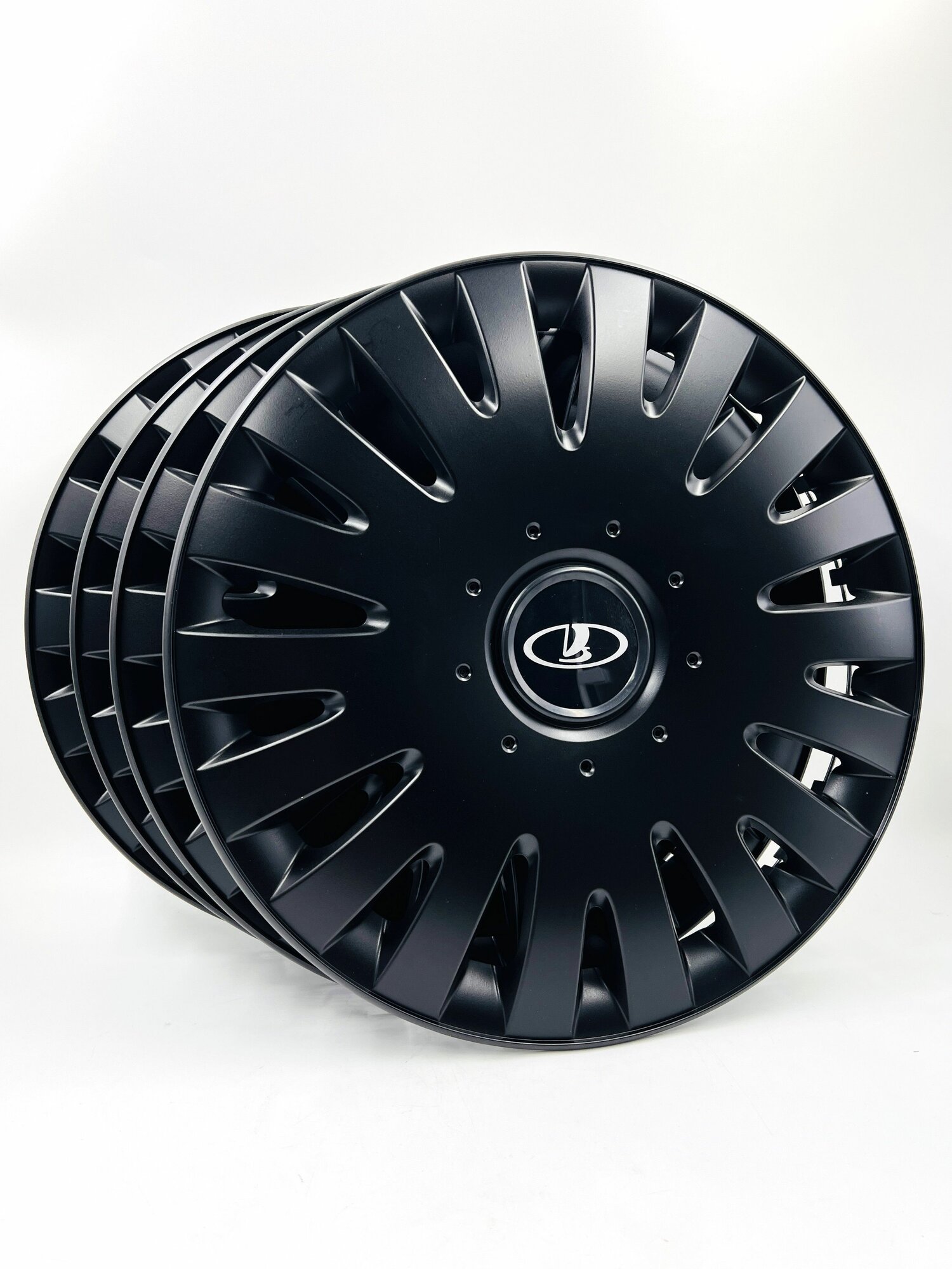 Колпаки на колеса гибкие черные с эмблемой R15 4 шт