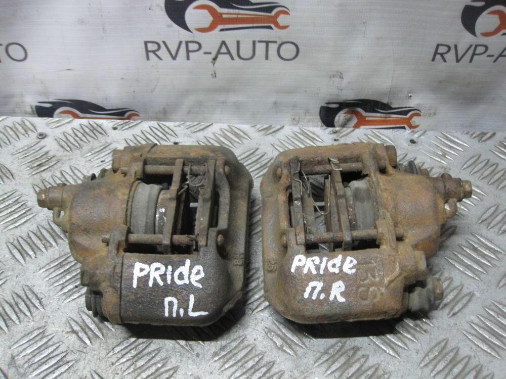 Суппорт тормозной передний Kia Pride 1.3 1990-2000