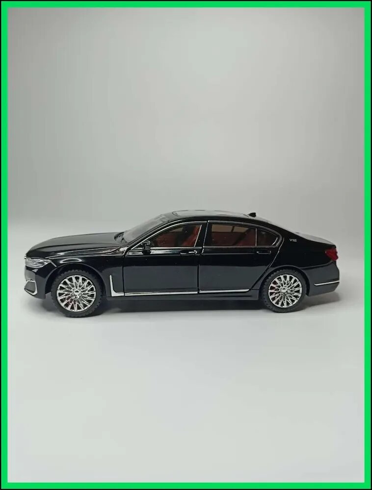 Игрушечная машинка BMW M7 черного цвета металлическая инерционная модель 1:24 — фото 1