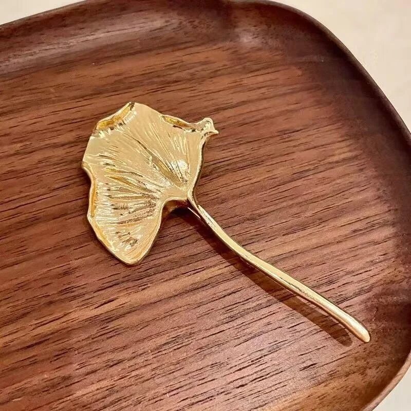 Брошь