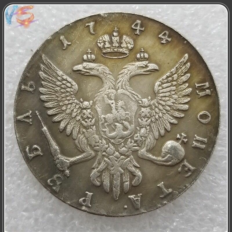 Это монета периода царской России, отчеканенная в 1744 году. царская монета 1744 старинная монета 1744 года