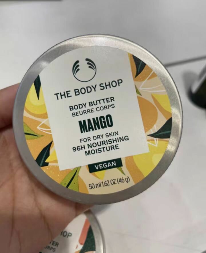 THE BODY SHOP Масло для тела увлажняющее и омолаживающее MANGO 50 мл