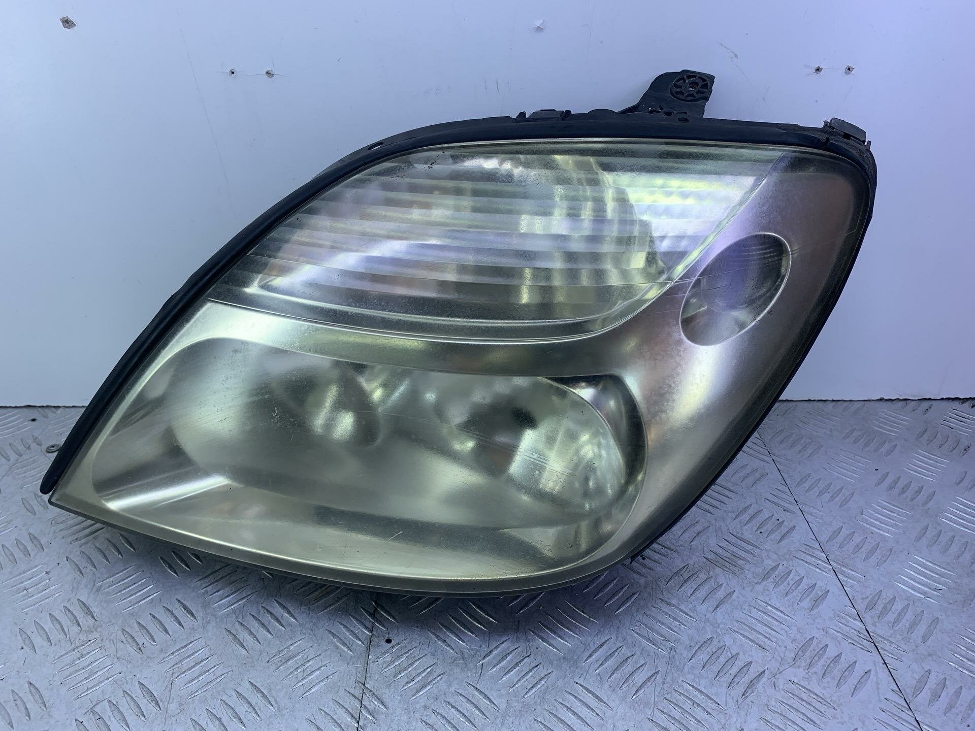 Фара левая Renault Scenic рест. 2001 7700432098