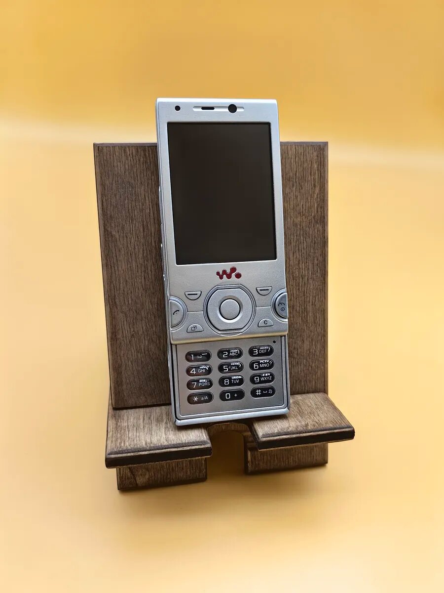 Мобильный кнопочный телефон слайдер Sony Ericsson W995