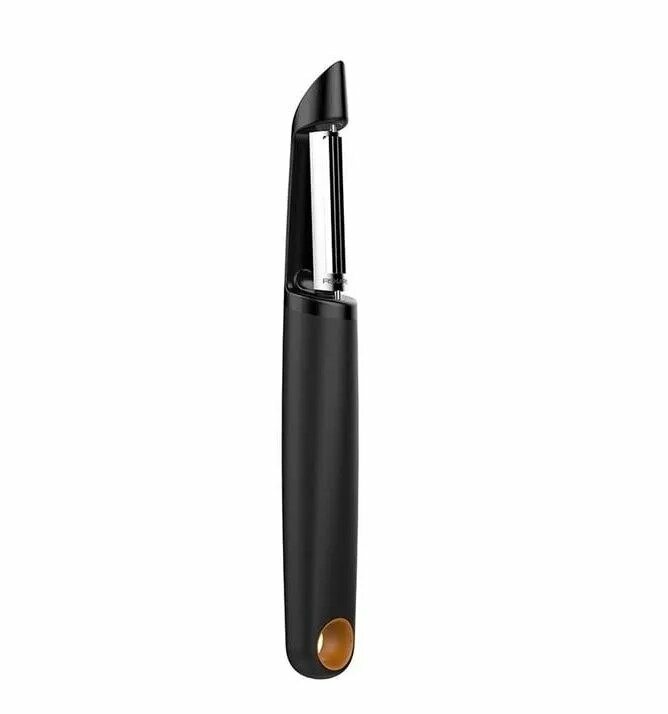 Овощечистка с вращающимся ножом Fiskars