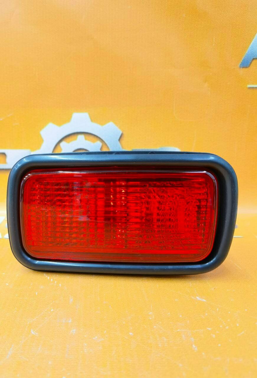 Задний левый фонарь в бампер Лансер 9 MITSUBISHI LANCER 9 туманка в бампер с рамкой