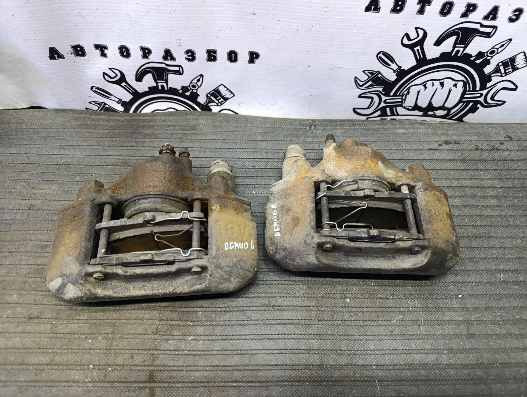 Суппорт тормозной передний левый Mazda Demio, I. с пробегом