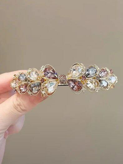 Заколка со стразами и искусственными камнями