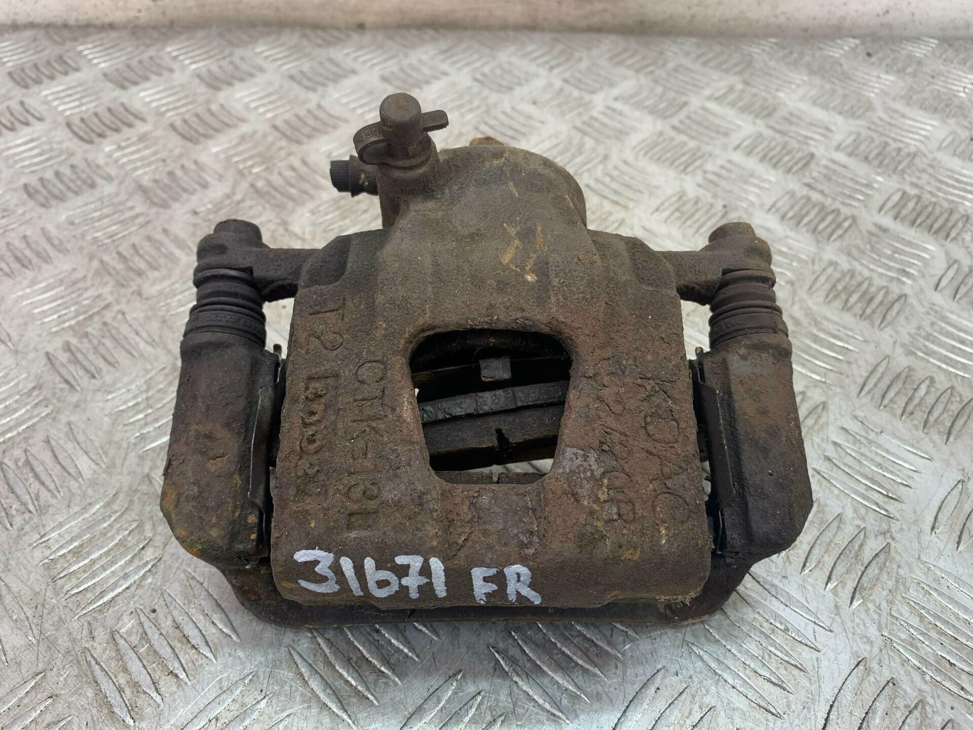 Суппорт тормозной передний правый Daewoo Kalos 2004