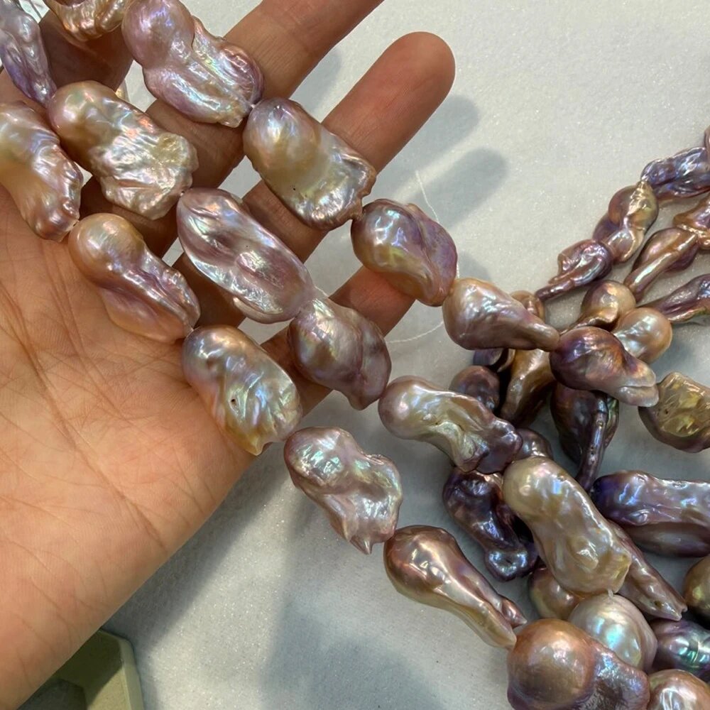 Большие фиолетовые барочные жемчужные бусины в форме рыбьего хвоста