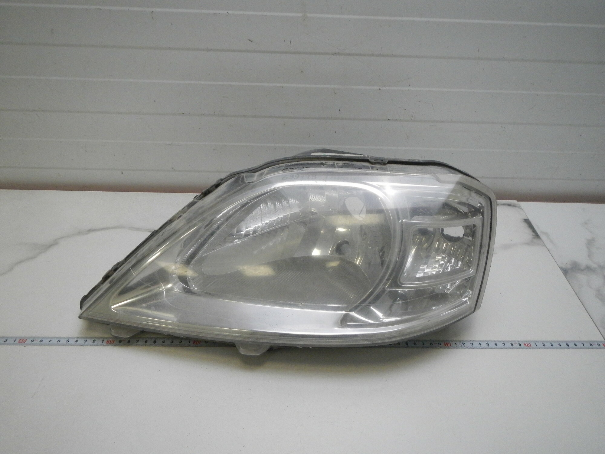 Б/У Фара левая, ВАЗ (VAZ)-LADA LARGUS (ларгус) LADA LARGUS (Ларгус) Царапины, грязь внутри, трещины на стекле, отколот к...