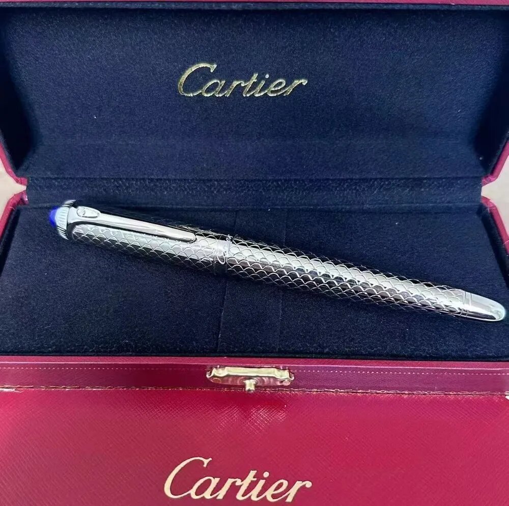 Cartier Шариковая ручка из серебра, с золотыми элементами и синим камнем, для элегантного письма — фото 1