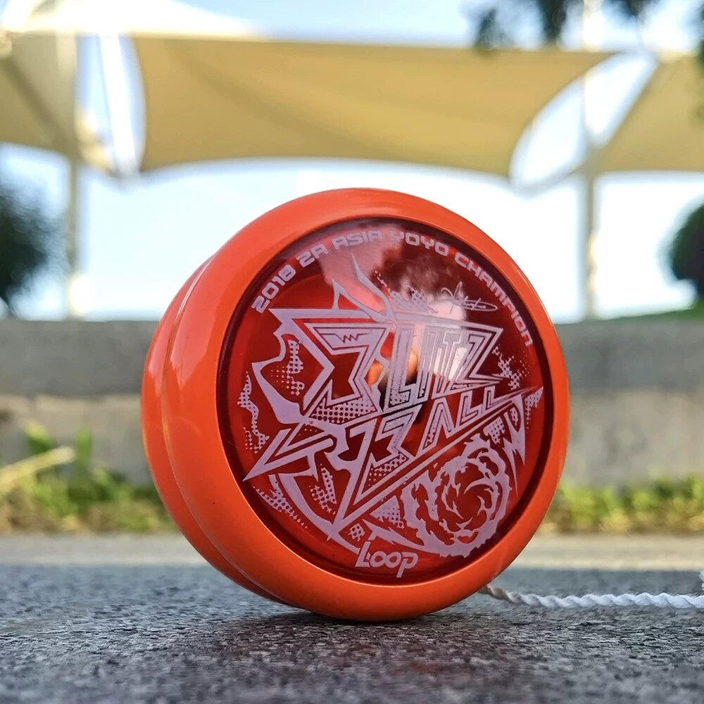 Оранжевый solid yo-yo с красной крышкой и белыми надписями - яркий старт