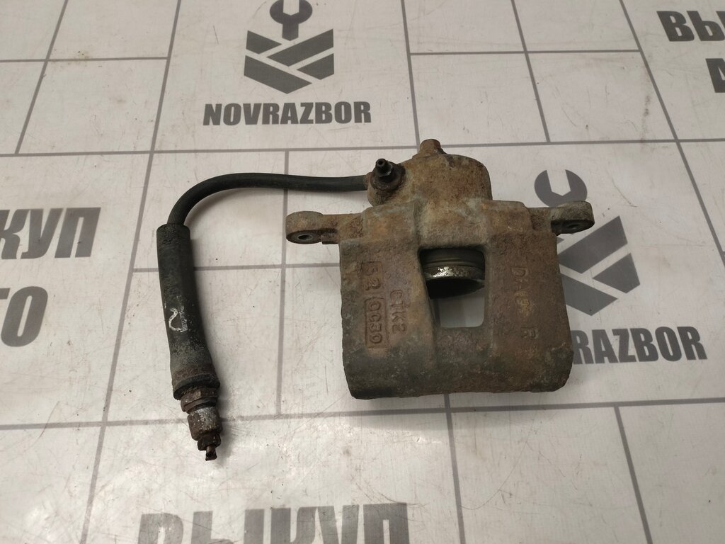 Суппорт передний правый Daewoo Nexia 95-16