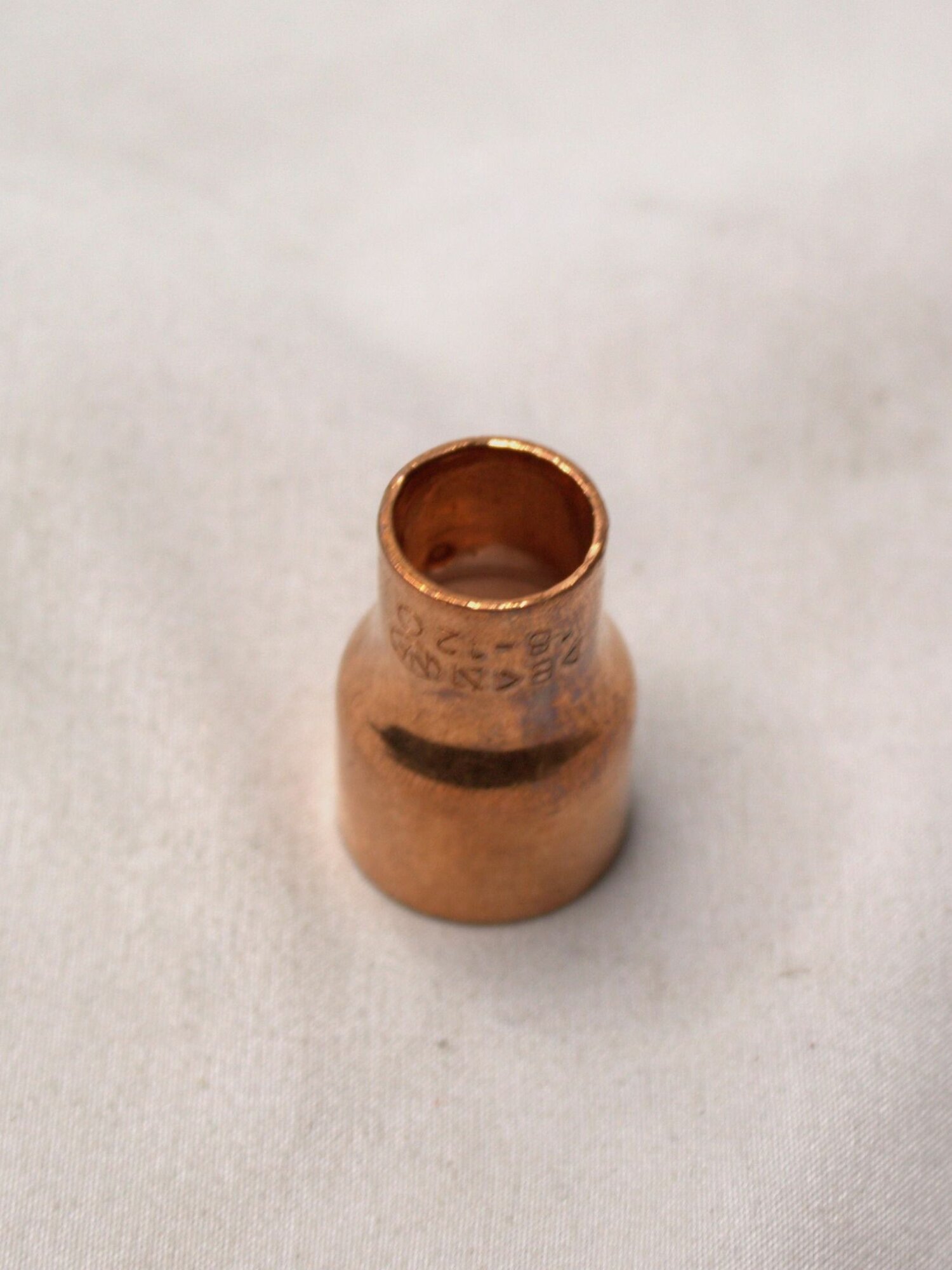 Муфта медная двухраструбная переходная 18х12