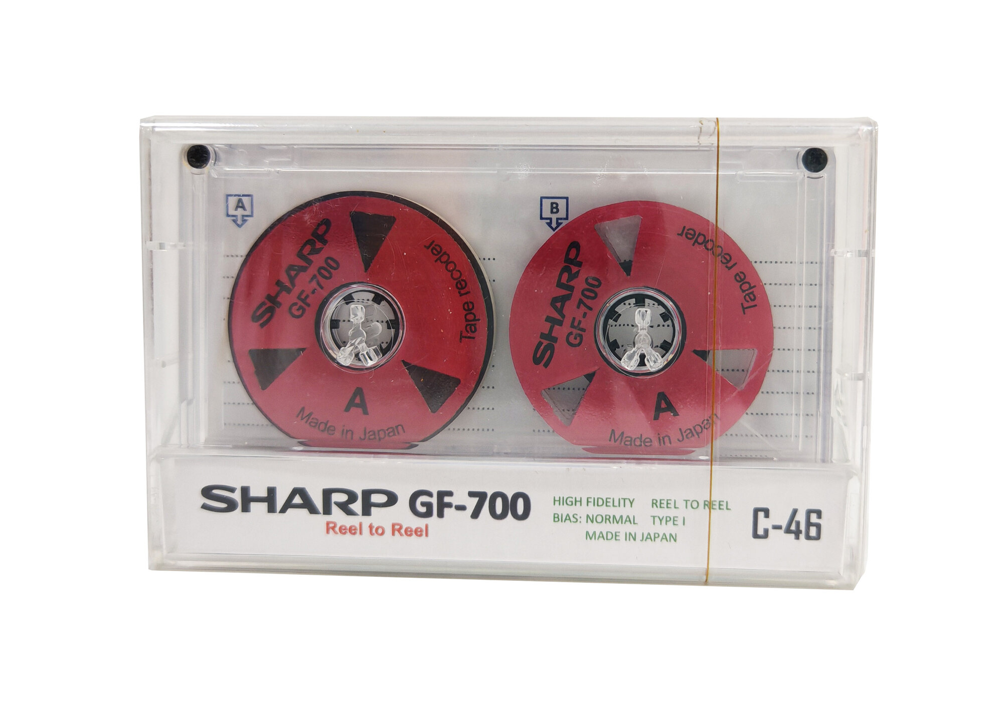Аудиокассета "SHARP GF-700" с тёмно-красными катушками