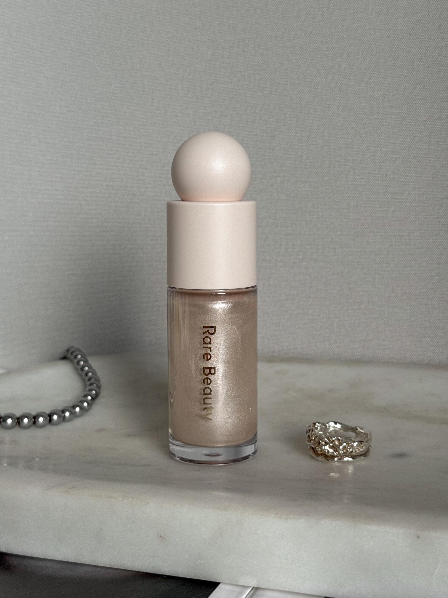 Жидкий хайлайтер люминайзер Rare Beauty Positive Light оттенок Enlighten
