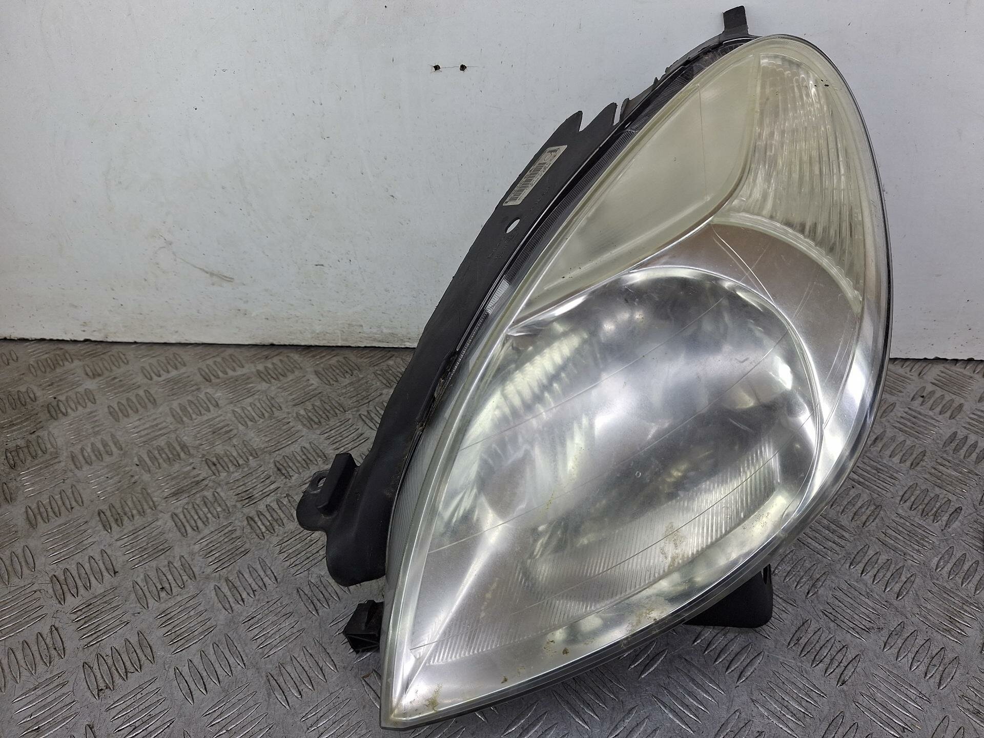 Фара левая Citroen Xsara Picasso рест. 2009 89310170