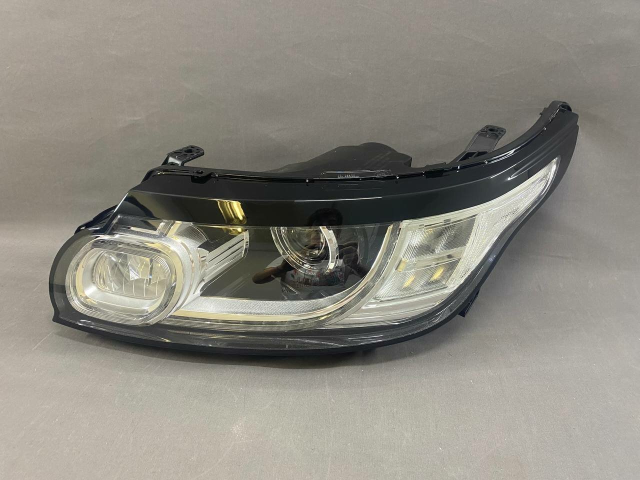 Фара левая Range Rоver Sport R14067L