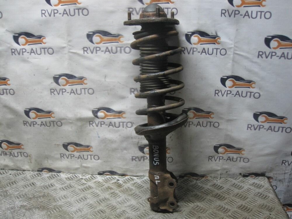 Амортизатор передний левый Chery Bonus A13 2011-14