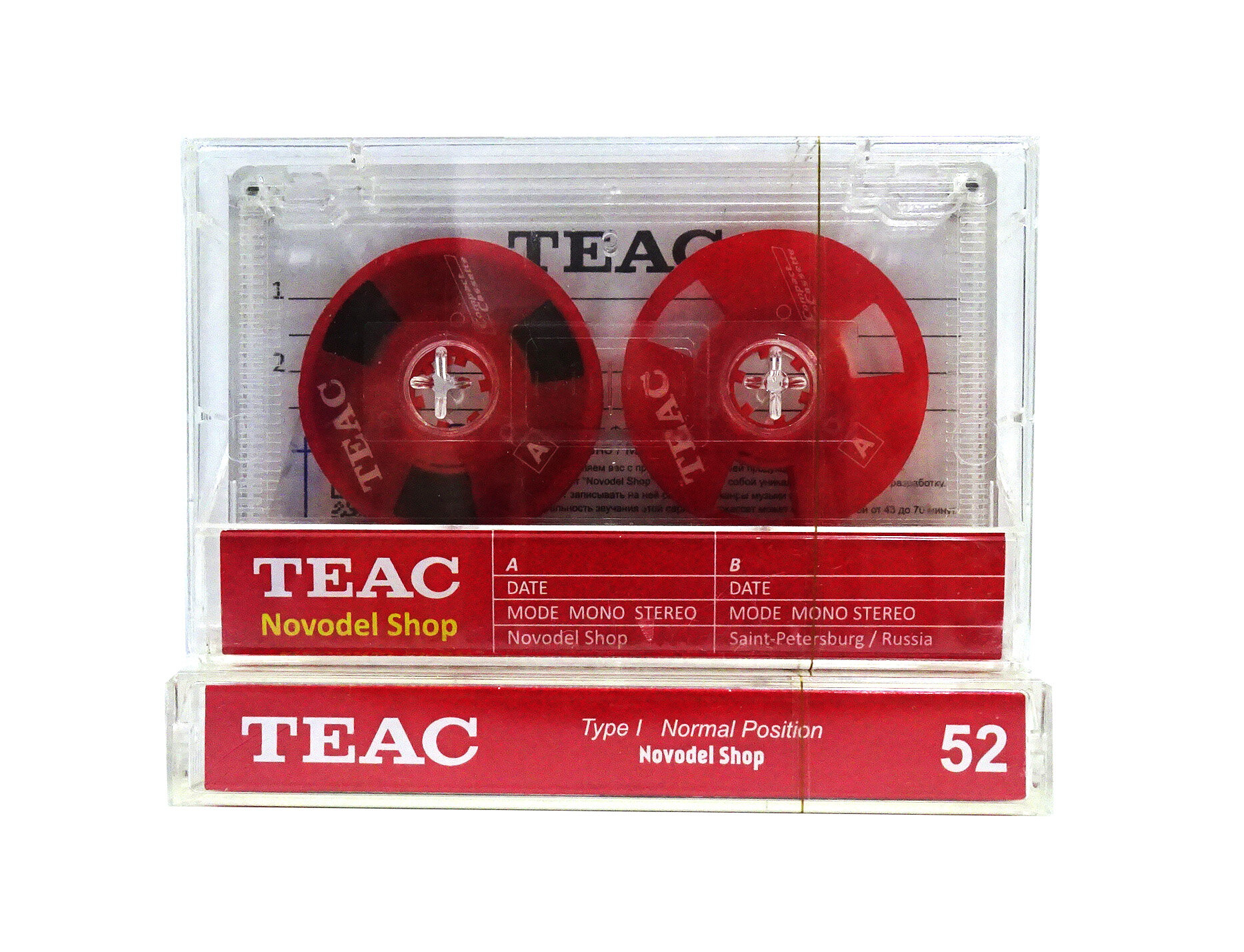 Аудиокассета "TEAC" с красными катушками и белым текстом