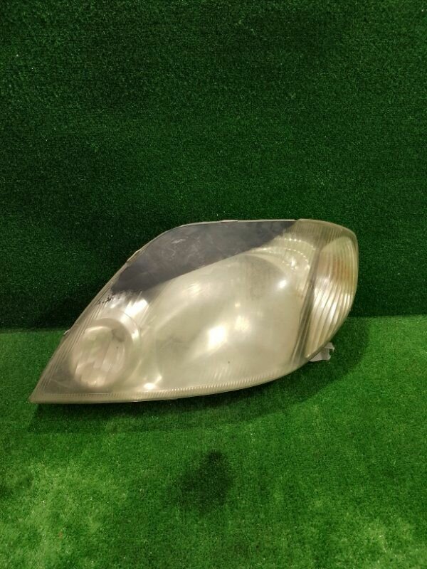 Фара левая Toyota Corolla Fielder 121 Б/У с пробегом