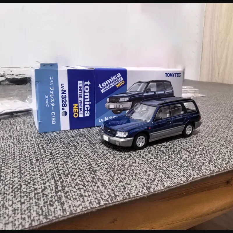 Модель автомобиля TOMY Subaru Forester 1:64 металлическая B
