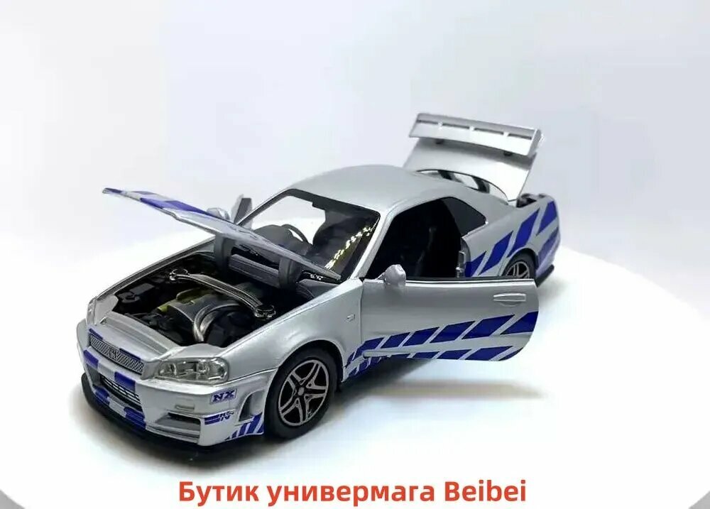 Детская игрушка металлическая инерционная модель Nissan Skyline R34 GTR ( Ниссан Скайлайн Р34 ГТР) / Масштаб 1:32