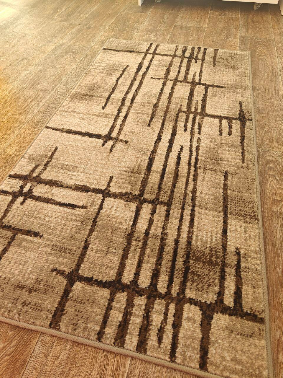 Коврик прикроватный коричневый на основу нанесен латекс и не скользит размер 80 на 150 прямоугольный формы