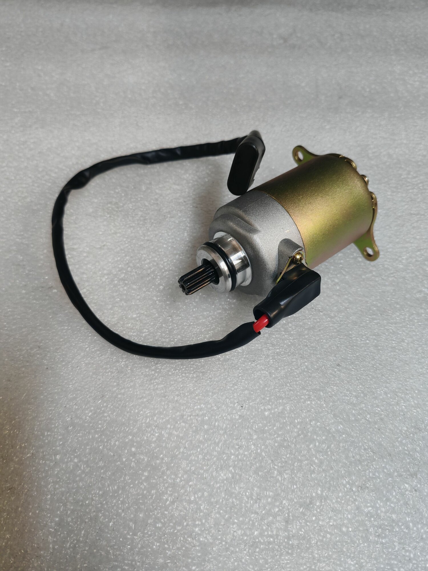 Электростартер на китайский скутер 4Т 152QMI, 157QMJ, ATV150 (9T)