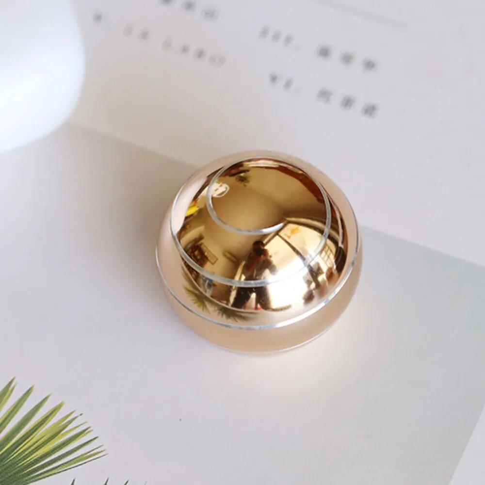 Кинетический вращающийся шар / Настольная игрушка фиджет / Металлический офисный антистресс