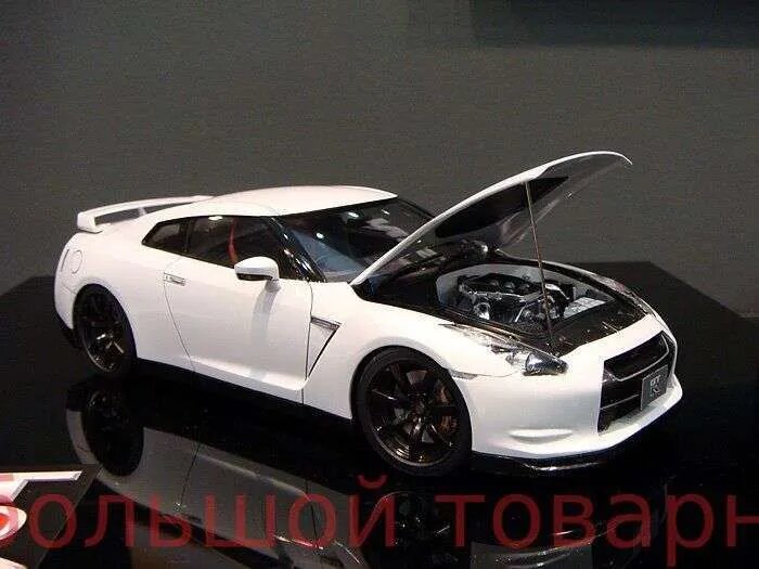 Сборная модель автомобиля Tamiya Nissan GT-R 1/24 Масштаб: 1/24 Для взрослых и детей от 14 лет — фото 1