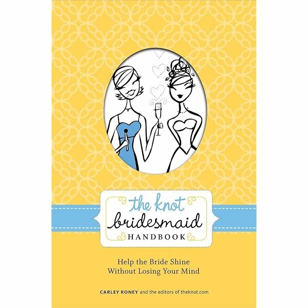 The Knot Bridesmaid Handbook: Help the Bride Shine Without Losing Your Mind，Reprinted paperback book