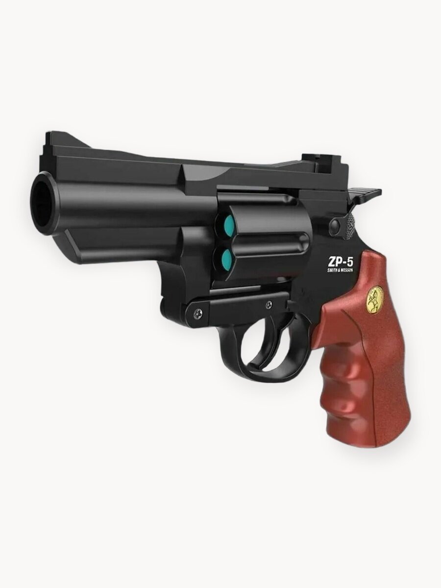 Игрушечный нерф револьвер. Игрушечное оружие стреляет мягкими пулями. В подарок мальчику. Цвет красный