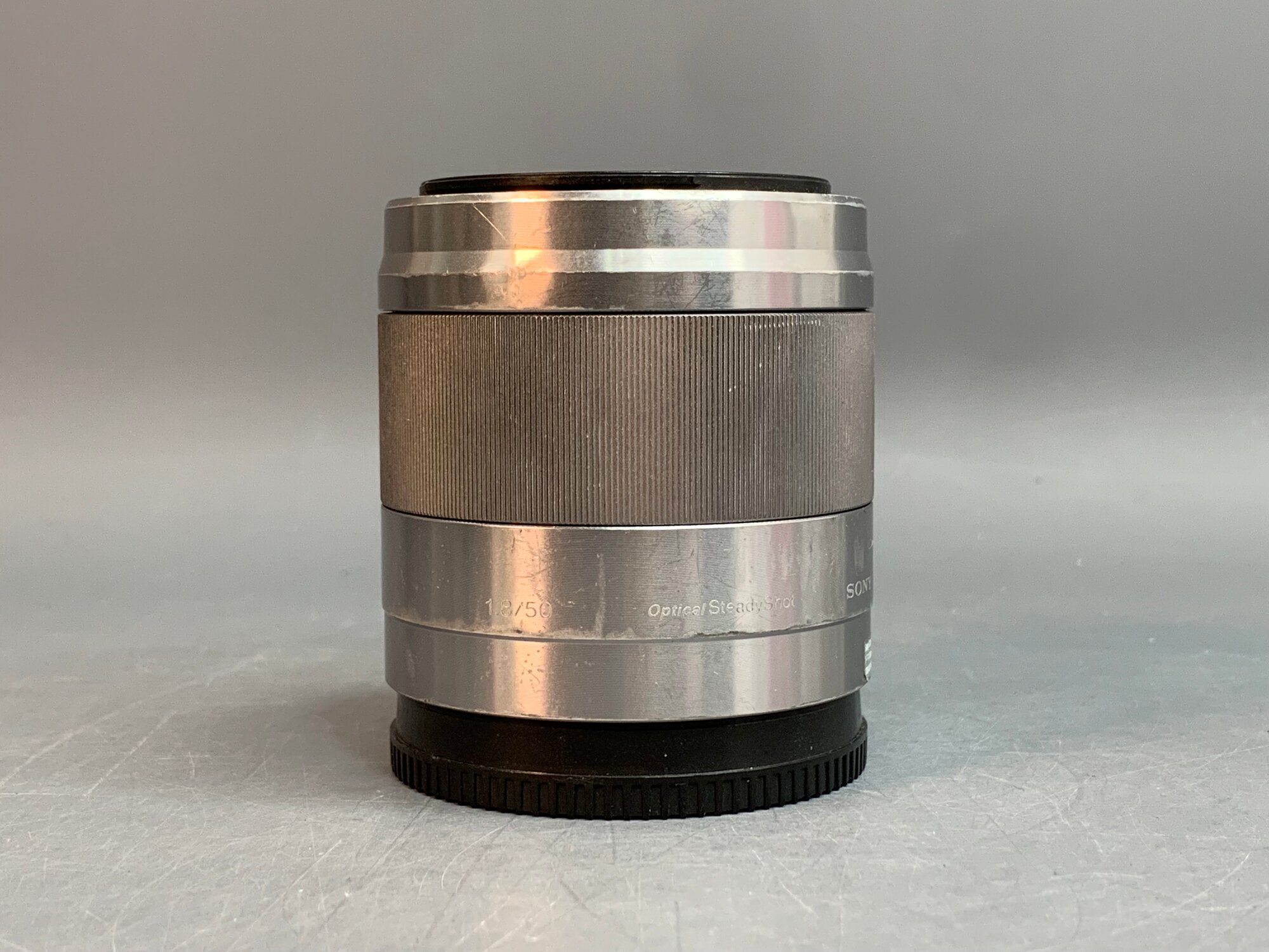 Sony 50mm 1.8 OSS внутри пыль