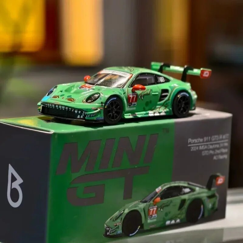 MINI GT 1:64 Porsche 911 IMSA, зелёный, 889