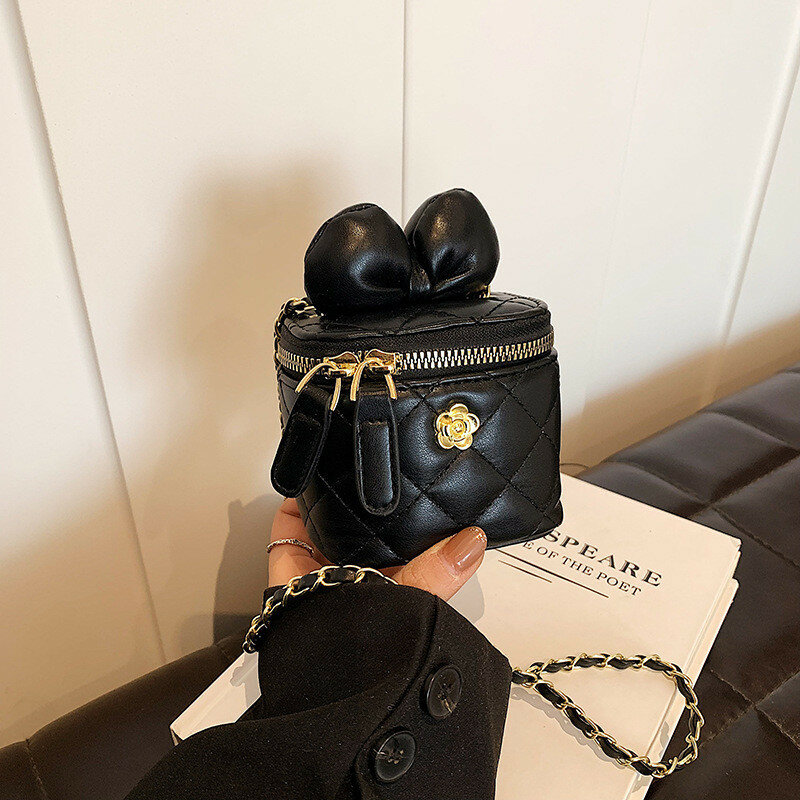 Delightful bow knot mini purse for girls with trendy chain strap and stylish patterns